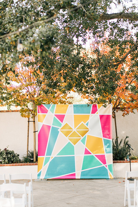 Colorful geometric backdrop | Wedding & Party Ideas | 100 Layer Cake