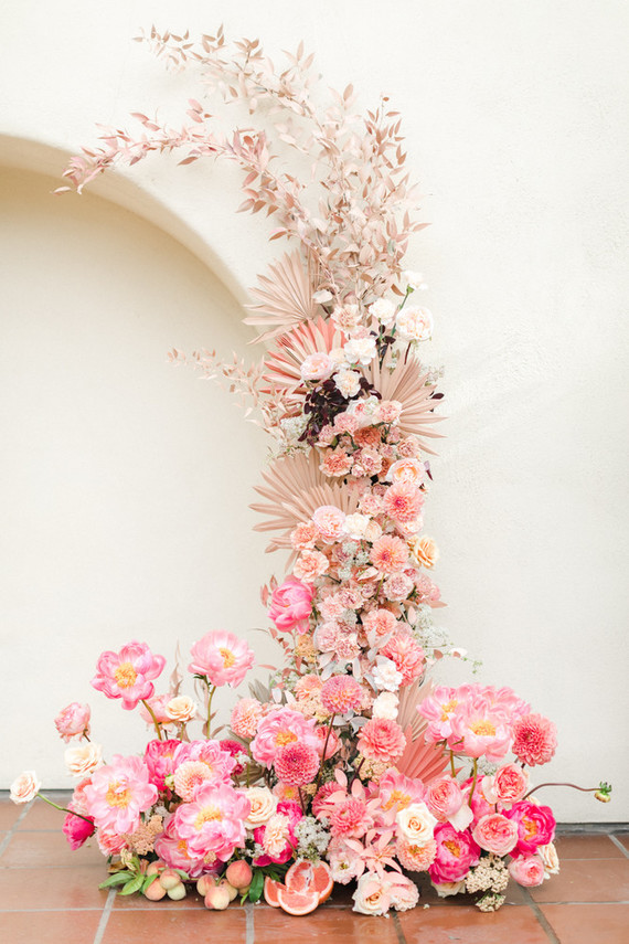 Colorful modern wedding with a killer tropical floral installation ...