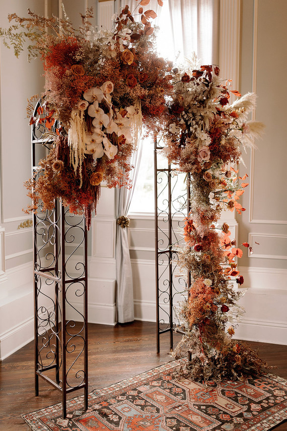 Lush fall floral ceremony arch with pampas | Wedding & Party Ideas ...